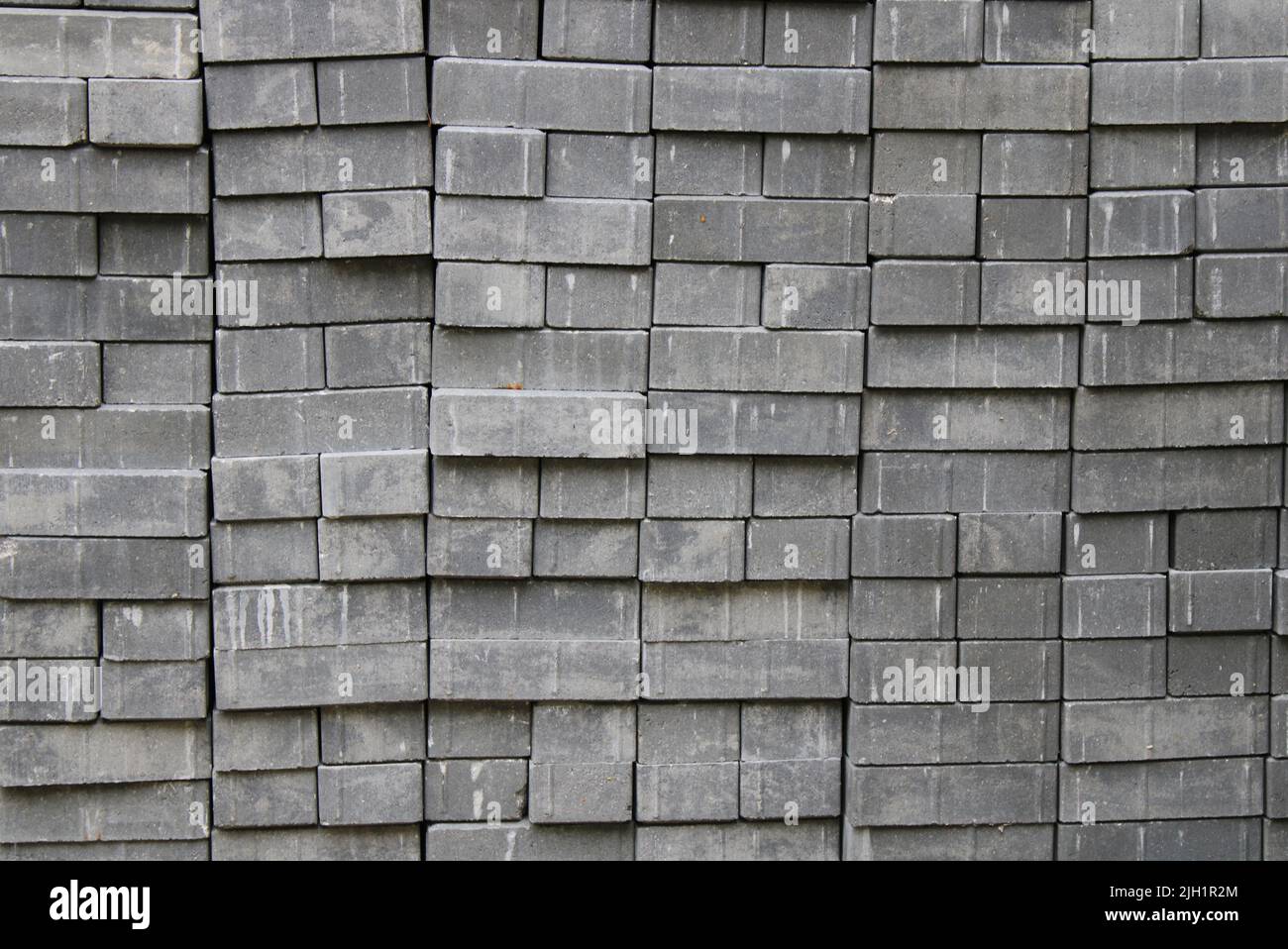 A Side View of a Stack of Gray Paver Bricks Stock Photo - Alamy