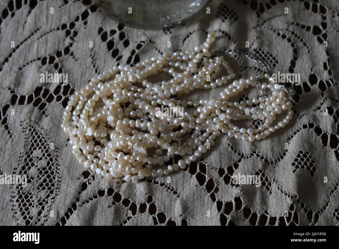 Frilly necklace hi-res stock photography and images - Alamy