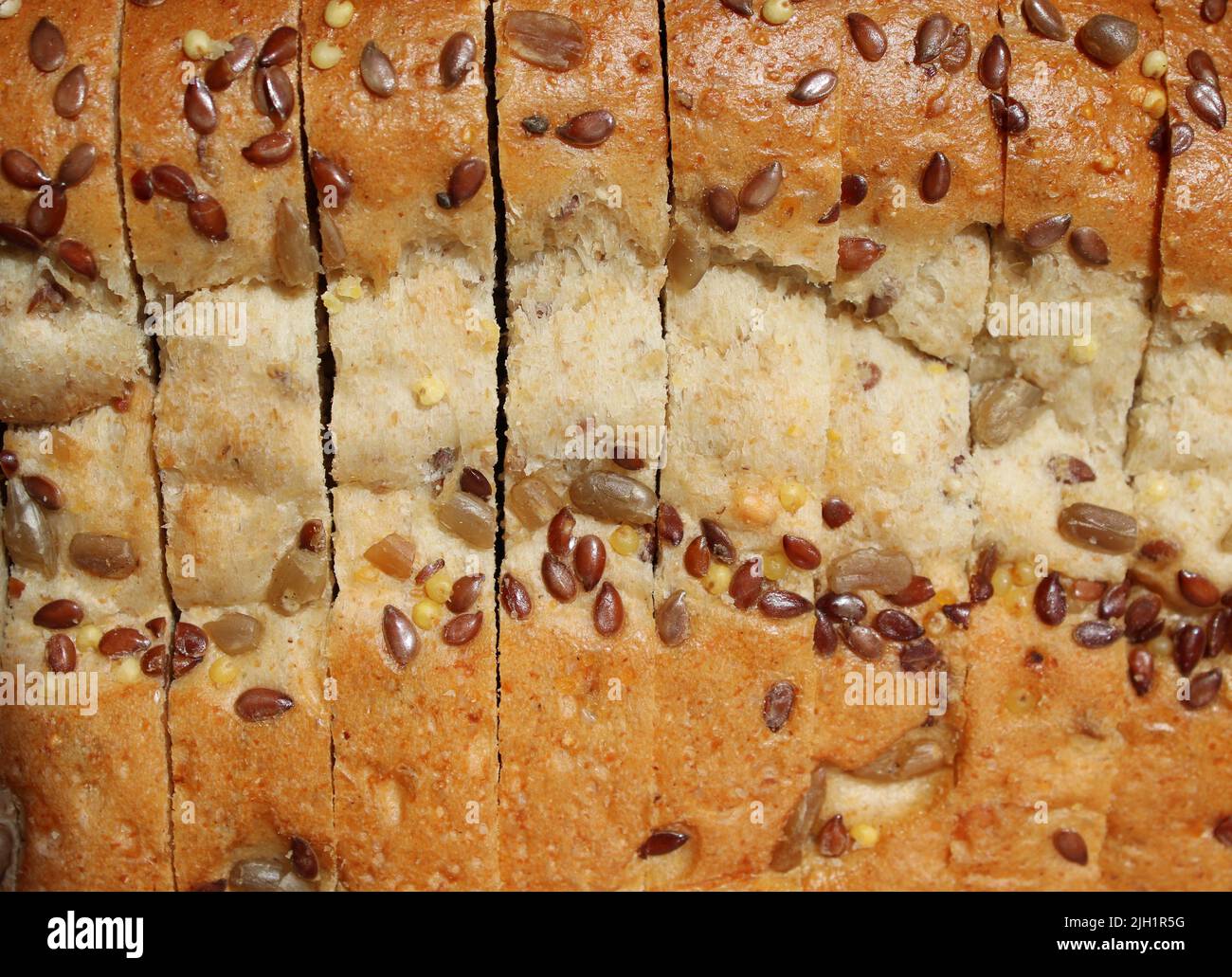 A Side View on a Loaf of Grain Bread Stock Photo - Alamy