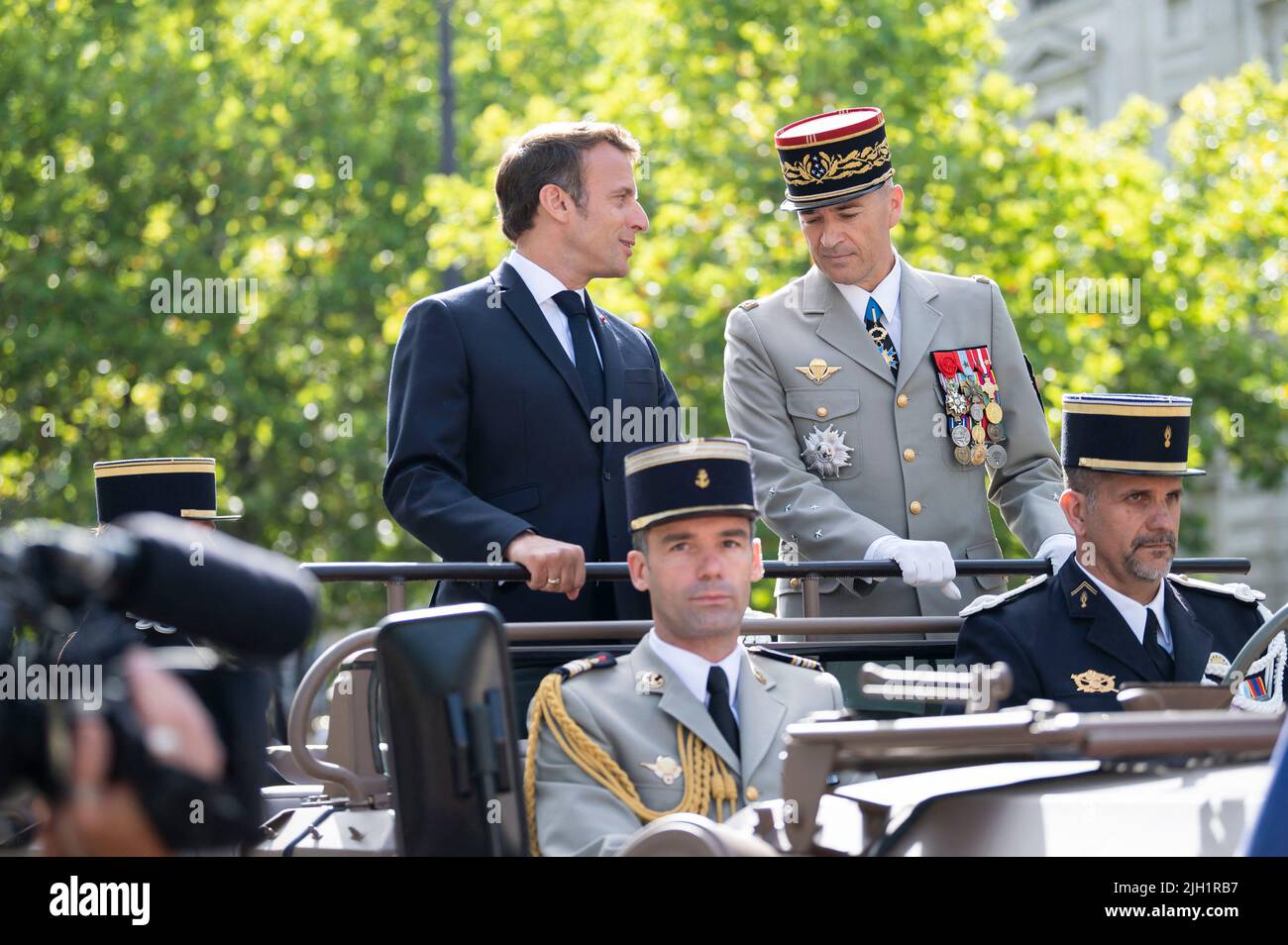 Paris, France, July 14, 2022, French President Emmanuel Macron stands ...