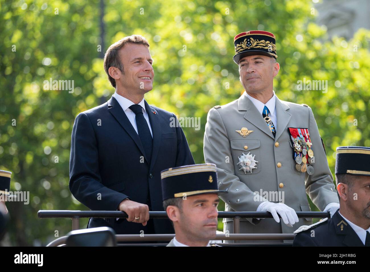 Paris, France, July 14, 2022, French President Emmanuel Macron stands ...