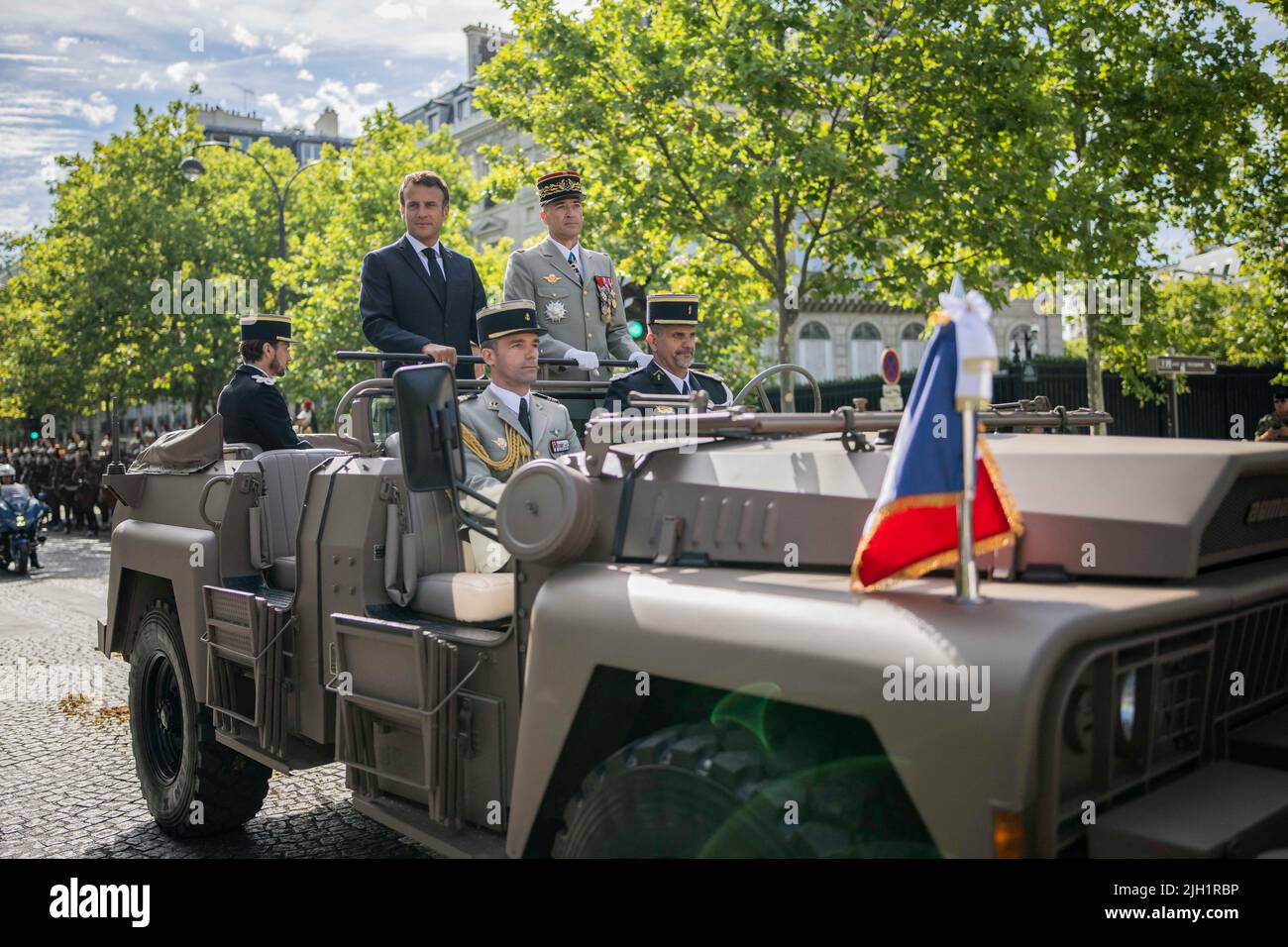Paris, France, July 14, 2022, French President Emmanuel Macron stands ...