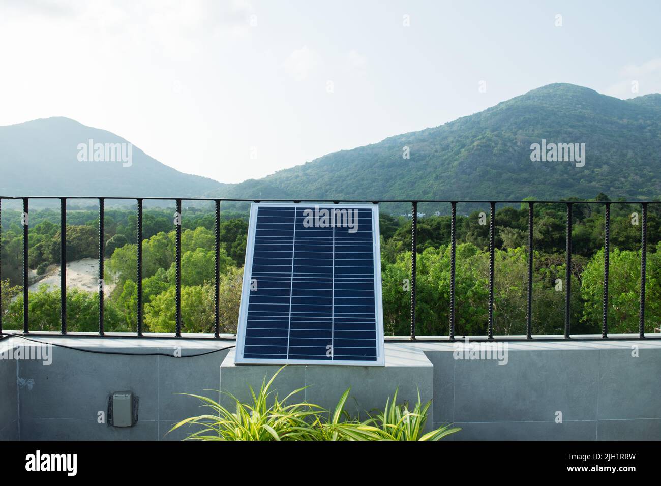 Solar panels on a rooftop terrace Stock Photo - Alamy
