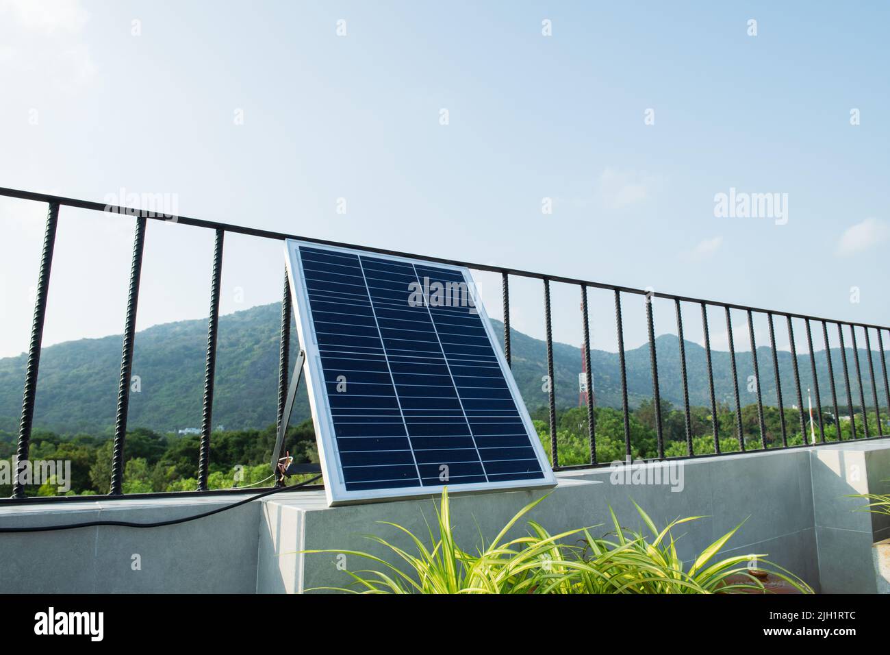 Solar panels mounted on the balcony terrace Stock Photo - Alamy
