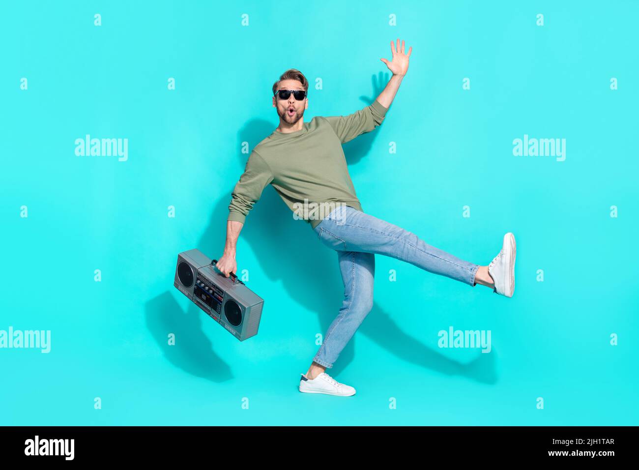 Full length photo of funny nice clubber man dance hold boom box radio ...