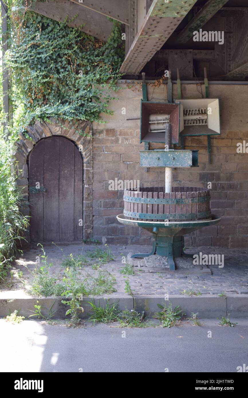 vine press under a bridge Stock Photo - Alamy