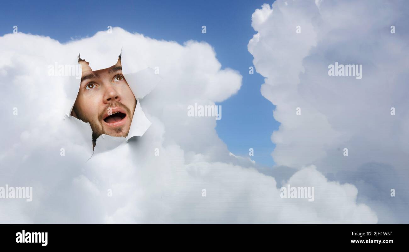 Face through hole hi-res stock photography and images - Alamy