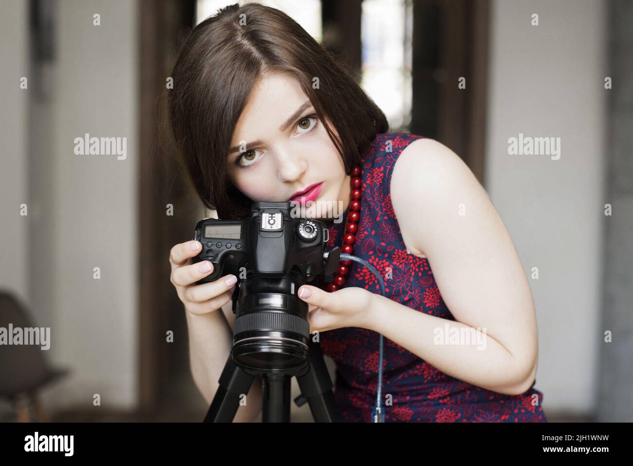 Female photographer shooting close hi-res stock photography and images ...