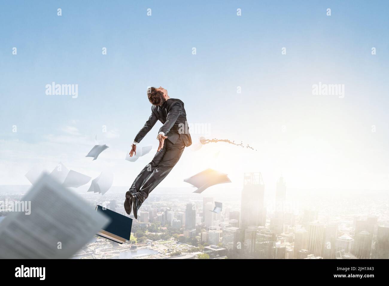 Man suit jump success paper hi-res stock photography and images - Alamy