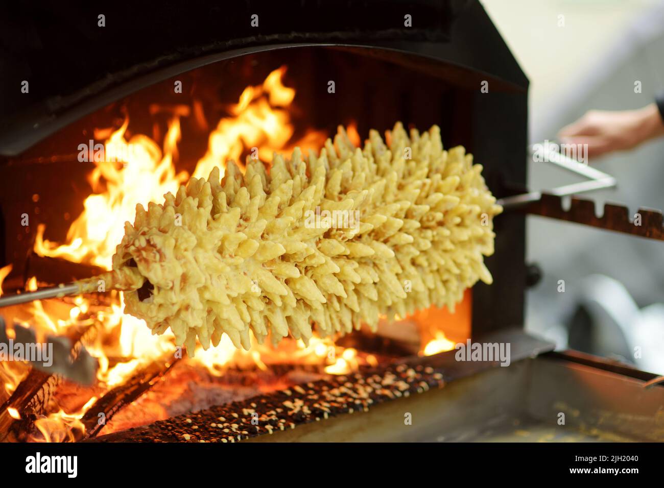 Traditional Lithuanian tree cake called sakotis baked at Kaziukas, an ...