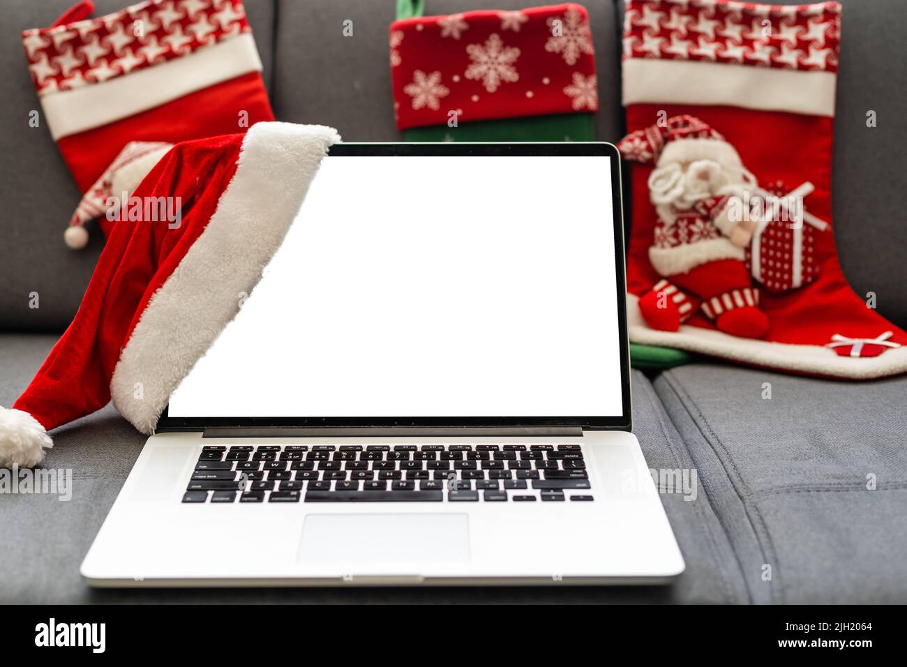 Laptop computer with white blank empty mock up screen on Merry ...