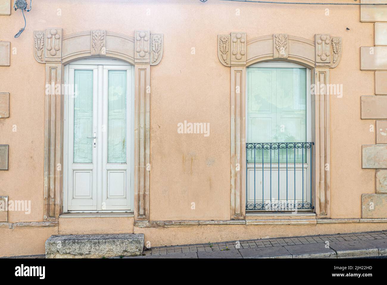 windows in the facades of ancient baroque houses Stock Photo - Alamy