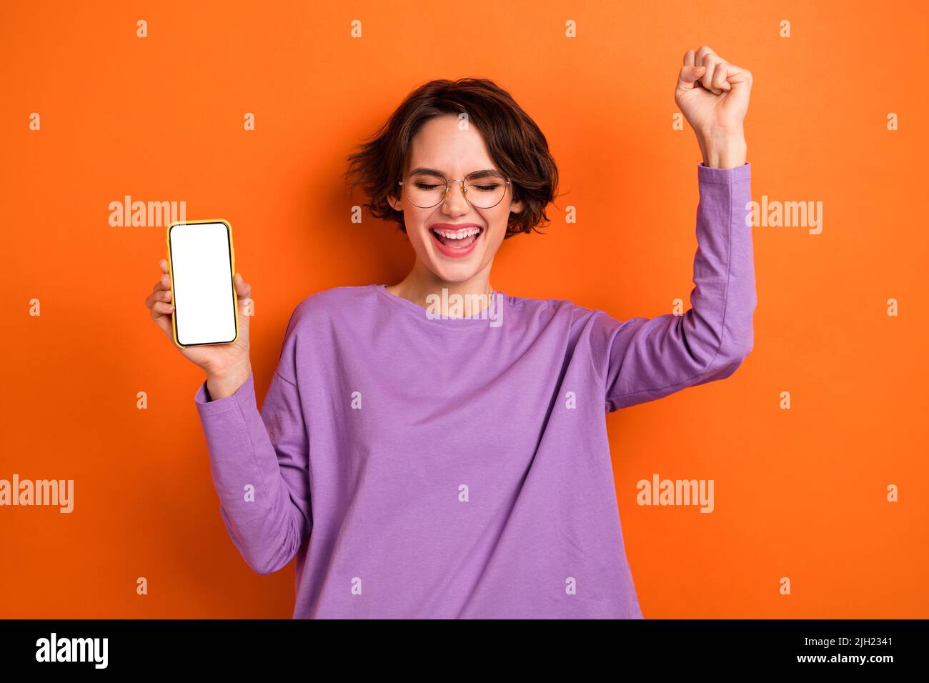 Portrait of delighted excited person raise fist up celebrate success ...