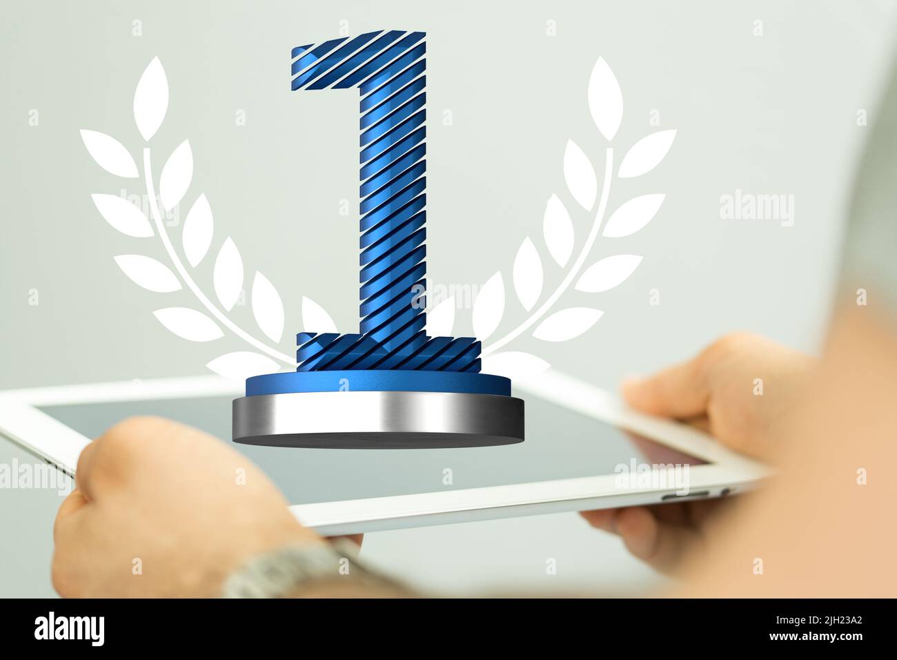 A 3D render of a number '1' prize near a tablet Stock Photo - Alamy