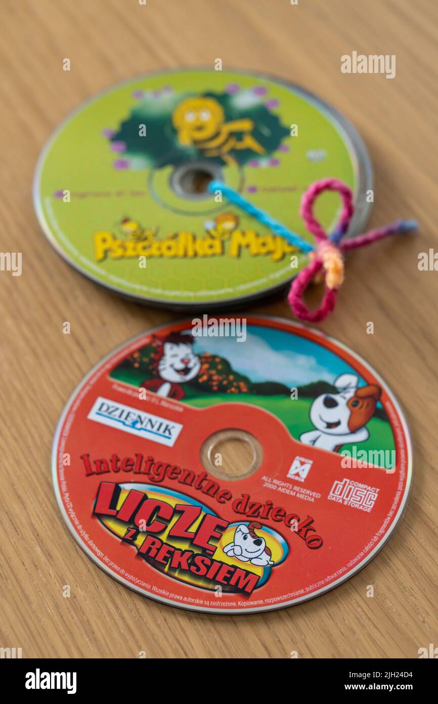 A vertical shot of Polish movie video compact discs for children on a ...