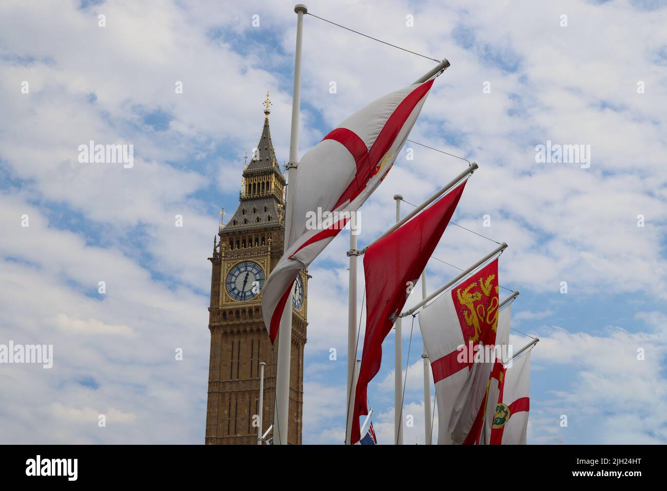 The flags of Parliament Square with Big Ben in the background, London ...