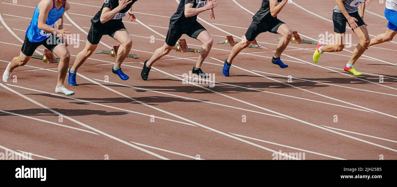 group athletes runners start running in sprint Stock Photo - Alamy