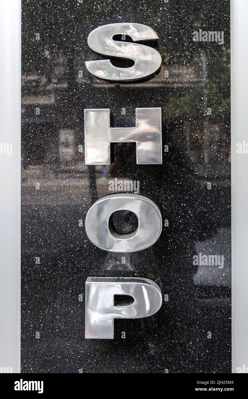 3d Silver Metal Sign at Black Marble Shop Stock Photo - Alamy