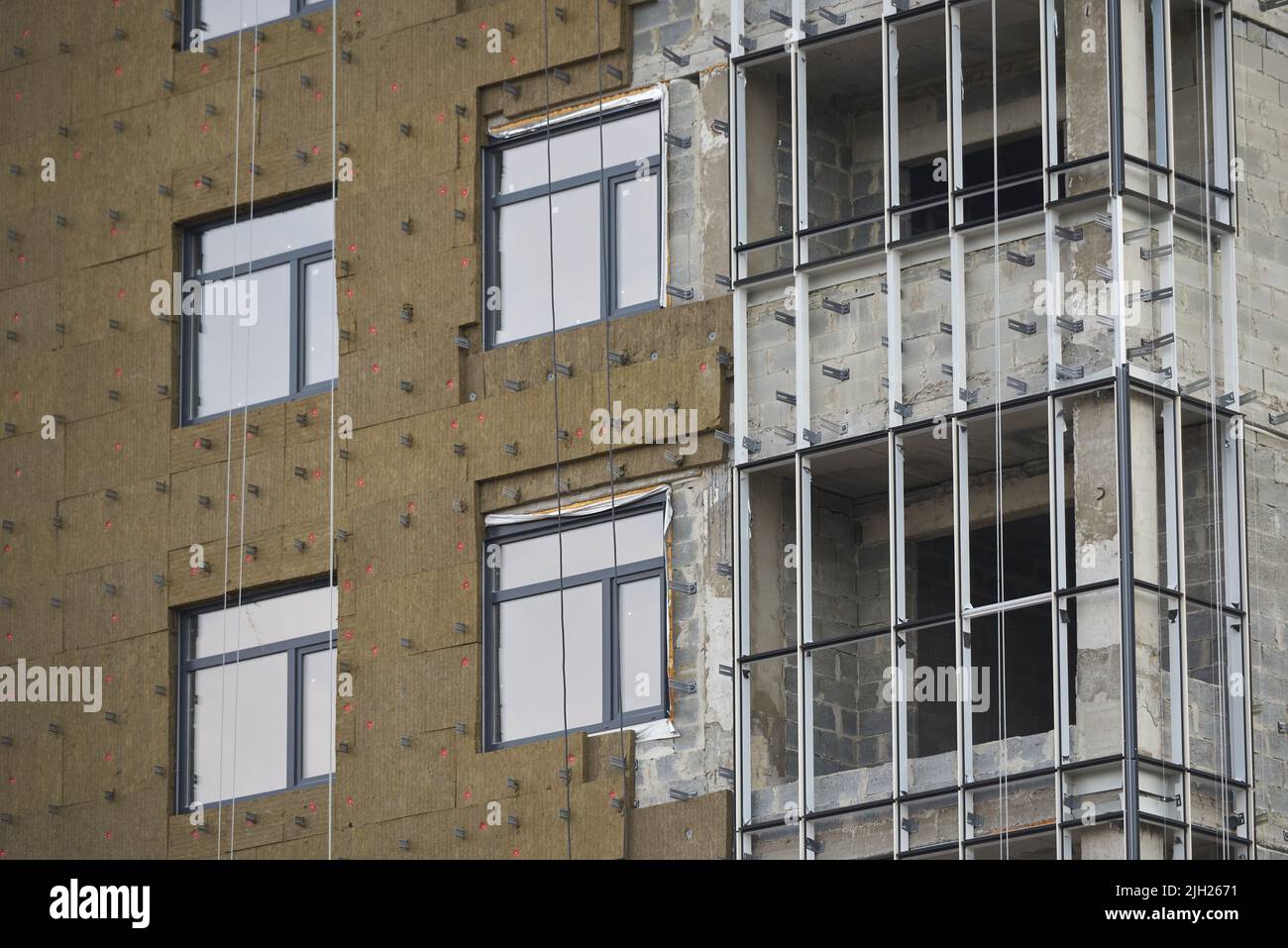 Construction of an apartment building and external walls insulation ...