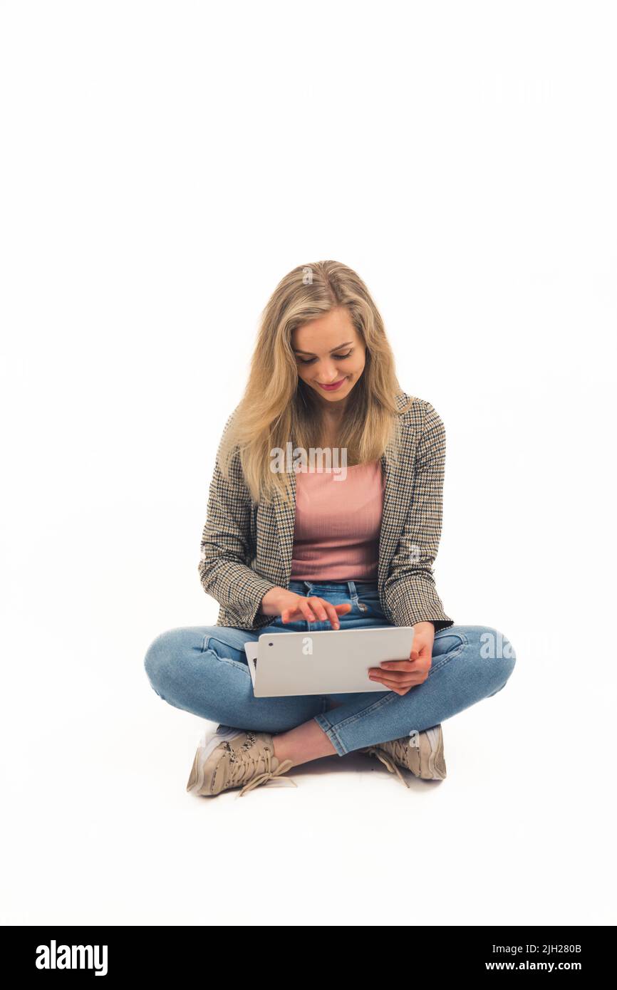 Young business woman typing in Cut Out Stock Images & Pictures - Alamy