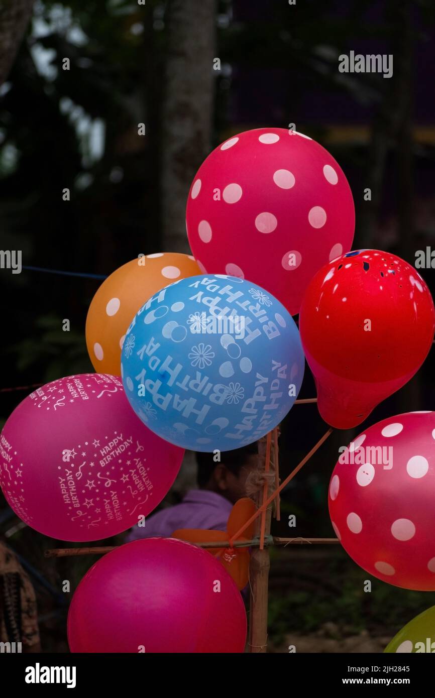 Selective focus of collection of colored balloons with different ...