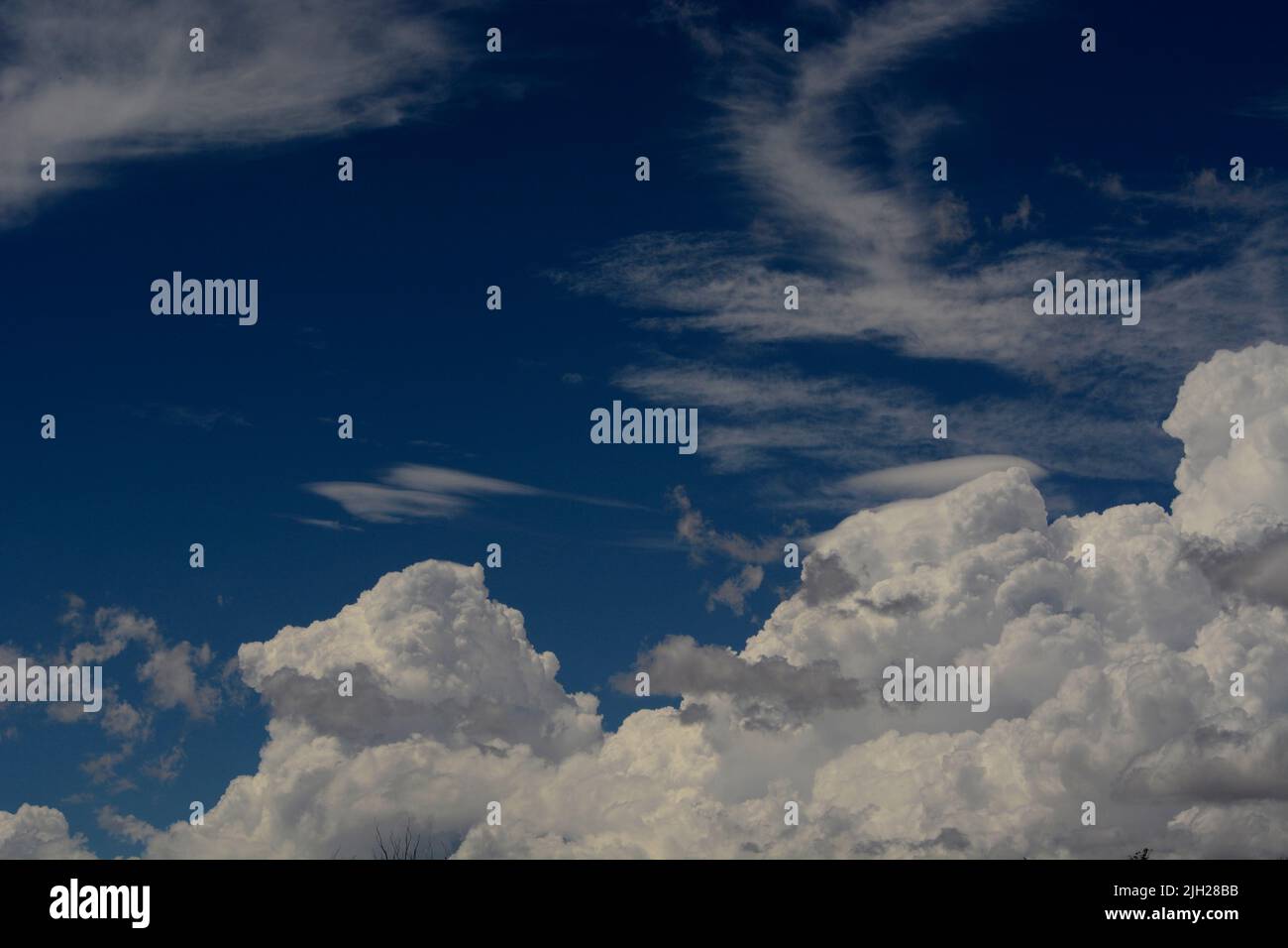 Cumulus and cirrus clouds fill the sky over Santa Fe, New Mexico Stock ...