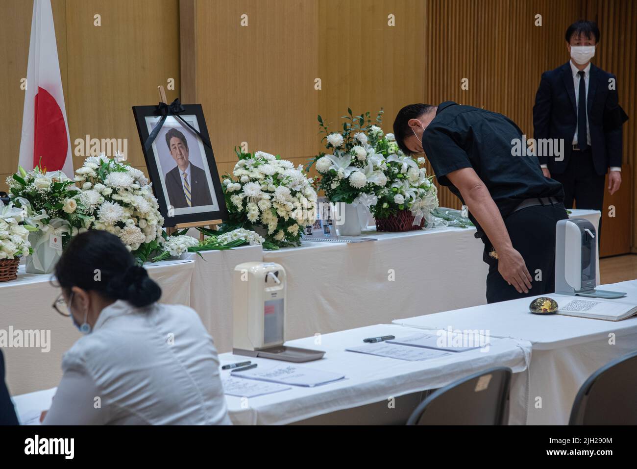 Bangkok, Thailand. 14th July, 2022. A man bows as a sign of respect ...