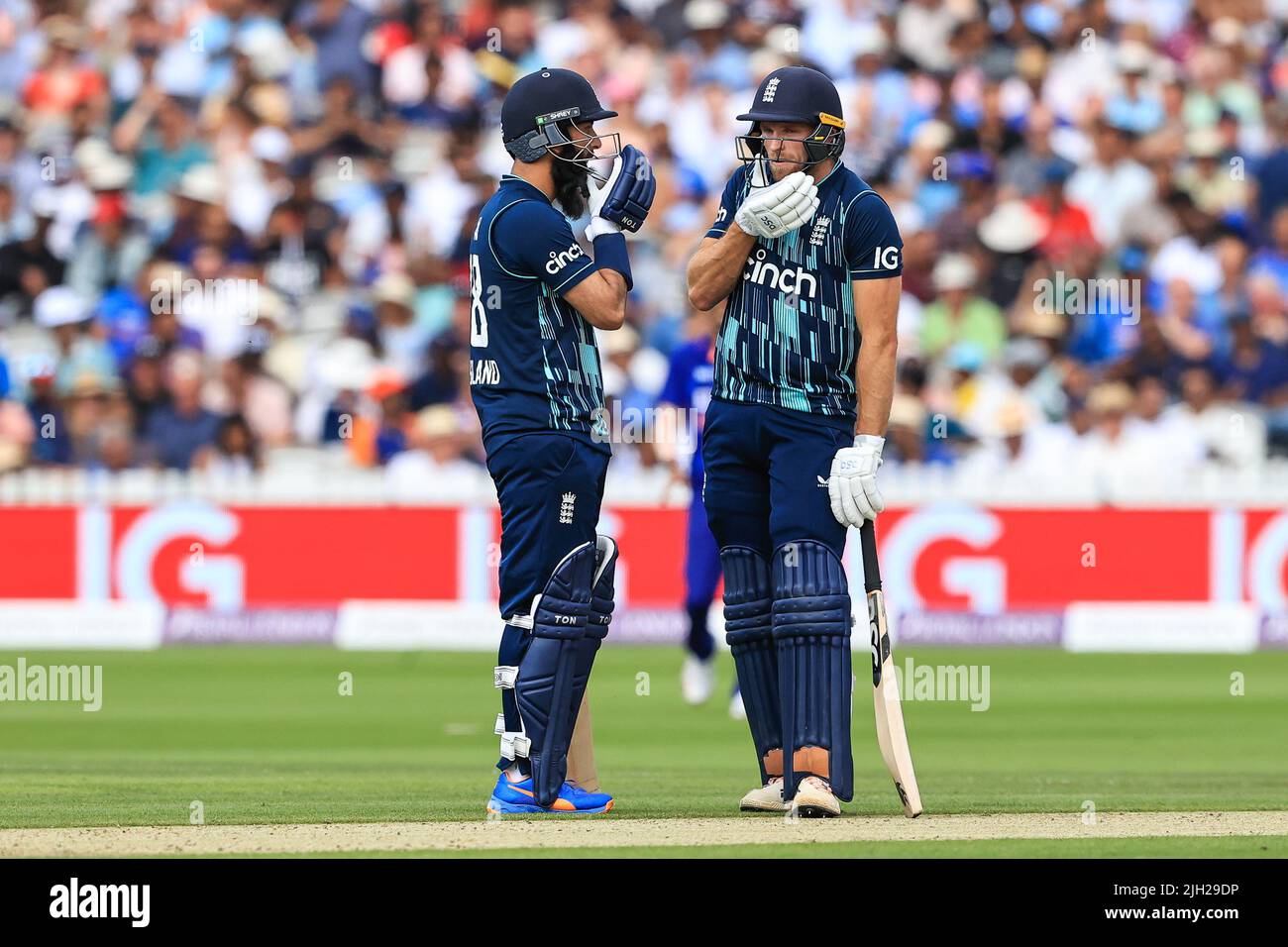 Moeen Ali and David Willey of England chat between overs Stock Photo ...