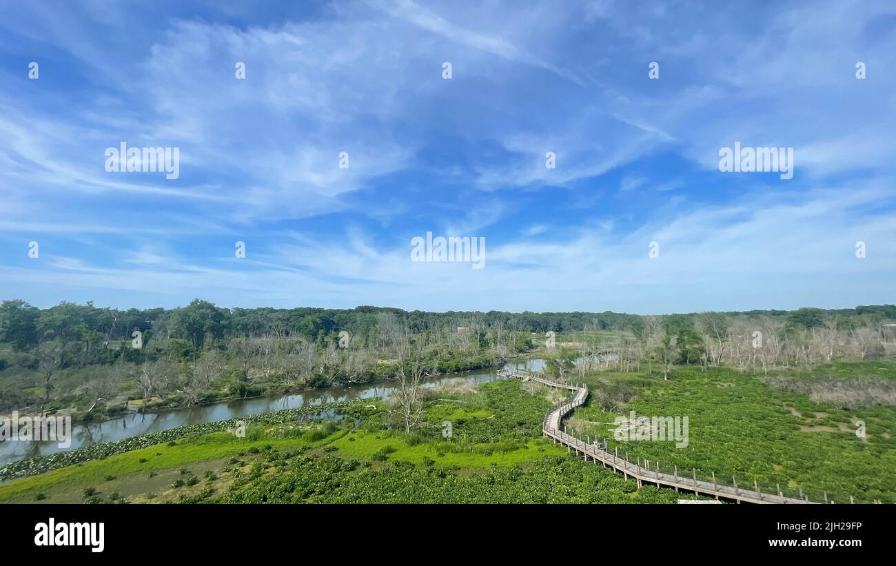 An aerial view of a valley with a river and a pathway Stock Photo - Alamy