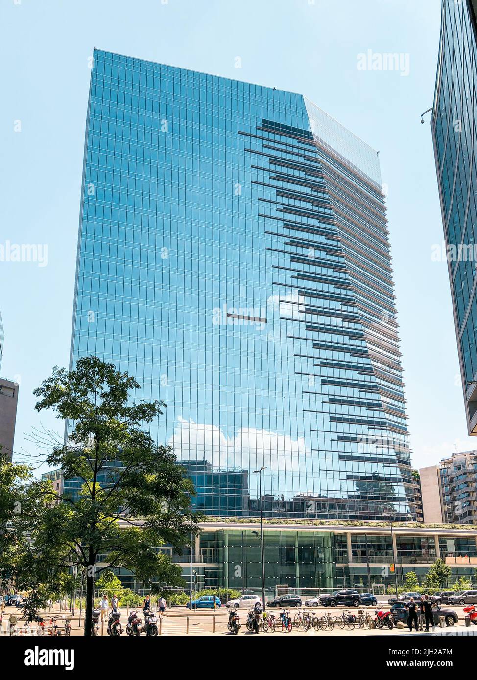 Glass and steel structure of a building in the center of Milan. View of ...