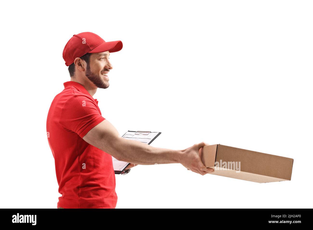 Delivery guy giving a package isolated on white background Stock Photo ...
