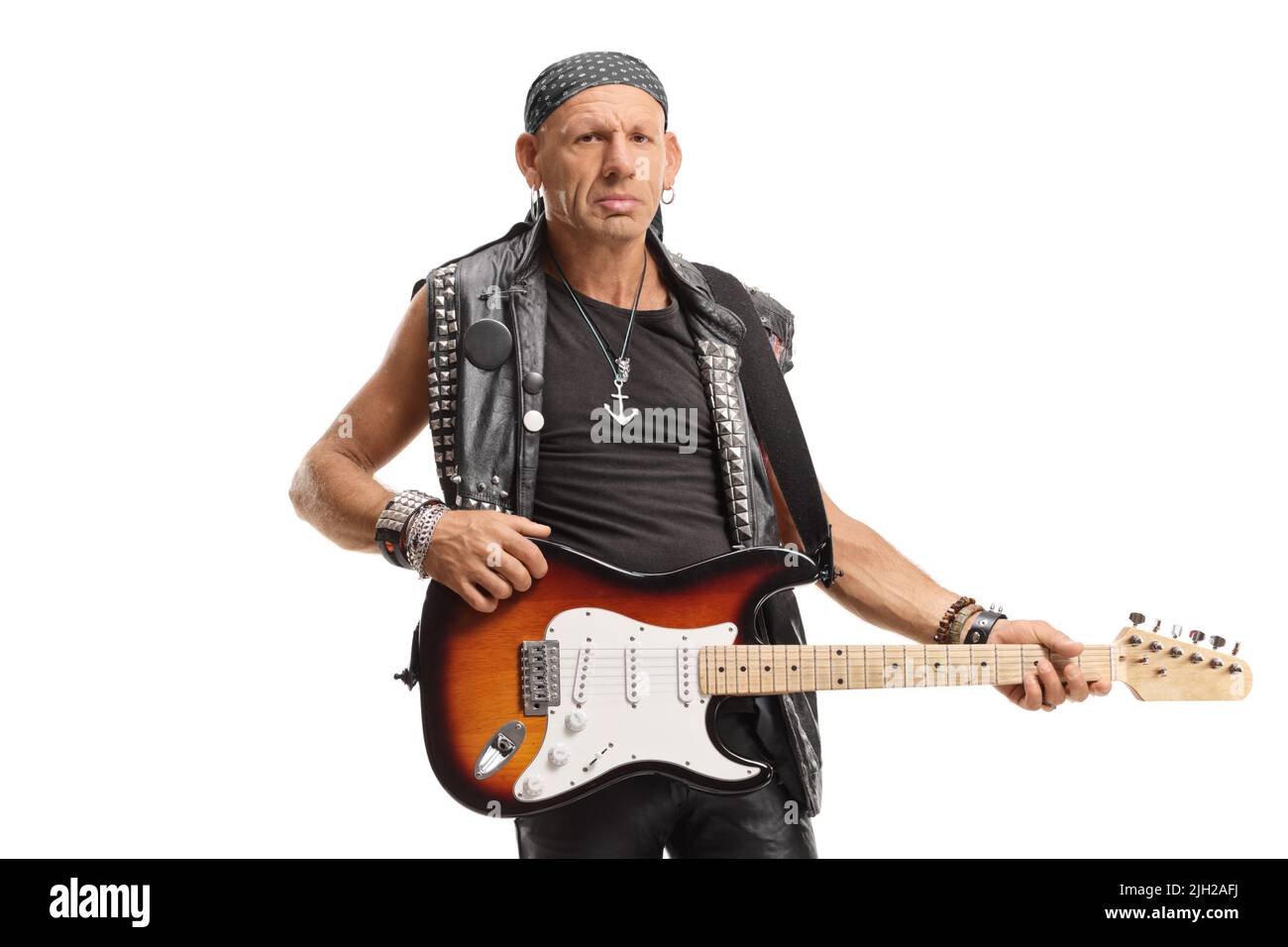 Male punk musician with a head scarf and a guitar isolated on white ...