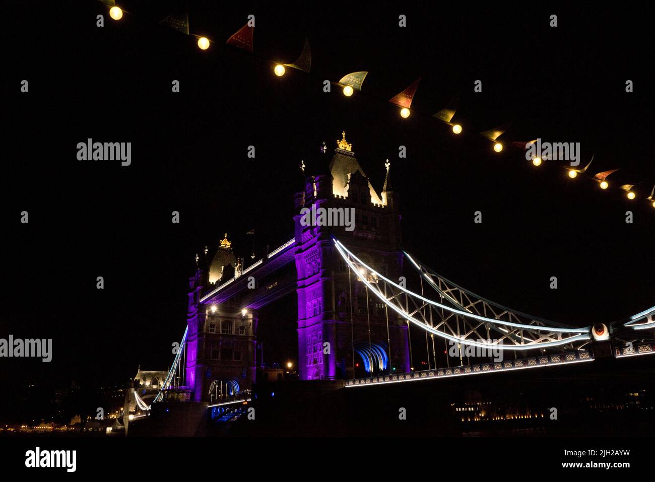 Tower Bridge illuminations by river Thames to commemorate Queen ...