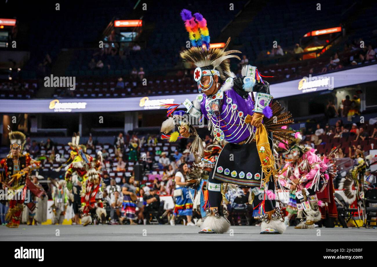 Native dancers perform during the Stampede Powwow at the Calgary ...