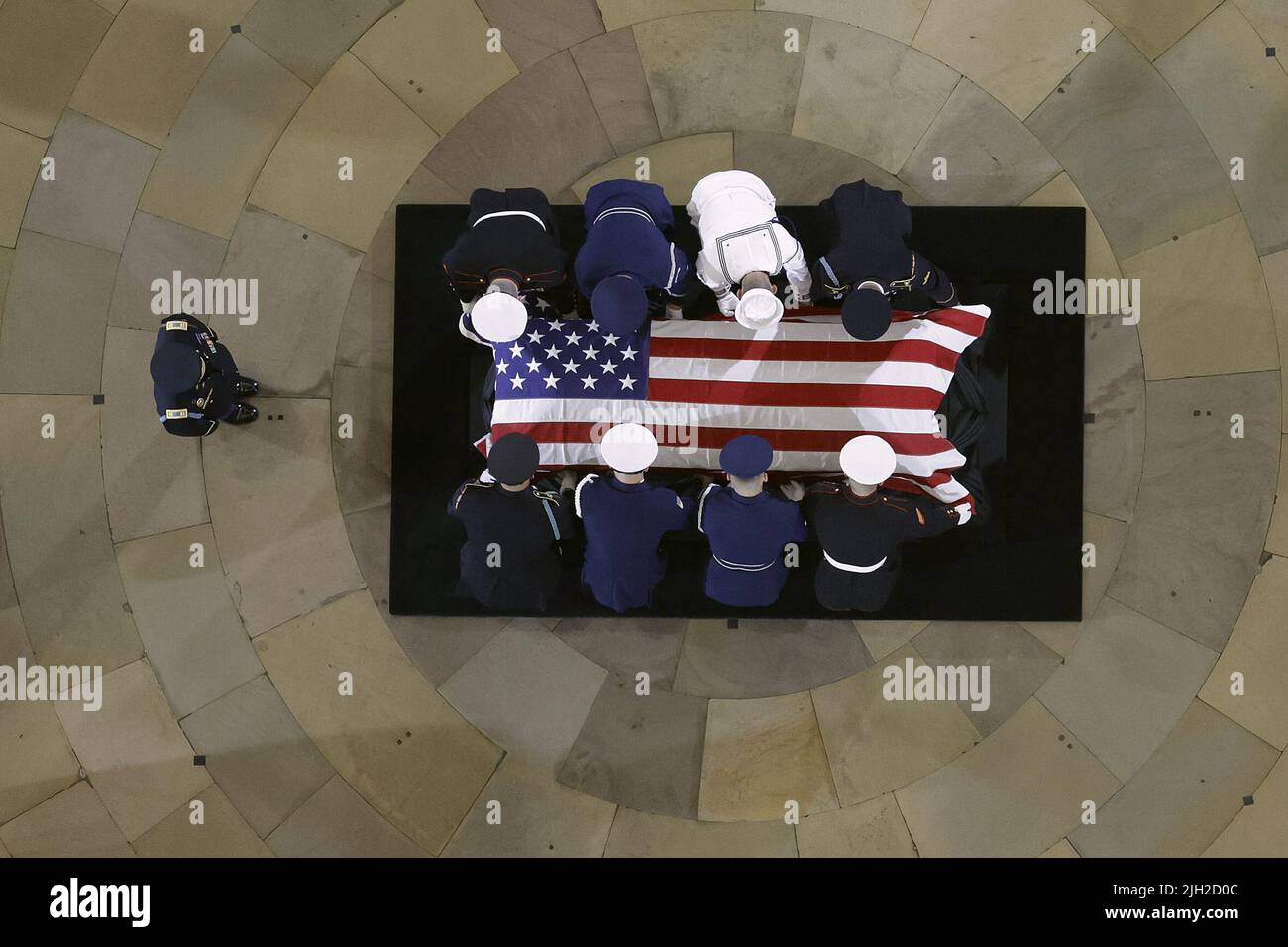 A casket team from the Military District of Washington places Herschel ...