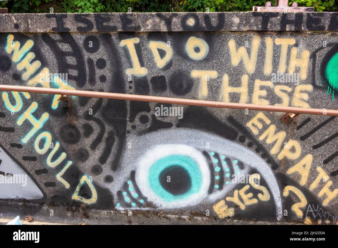 Expressive graffiti street art on a subway wall, Cardiff, Wales, UK ...