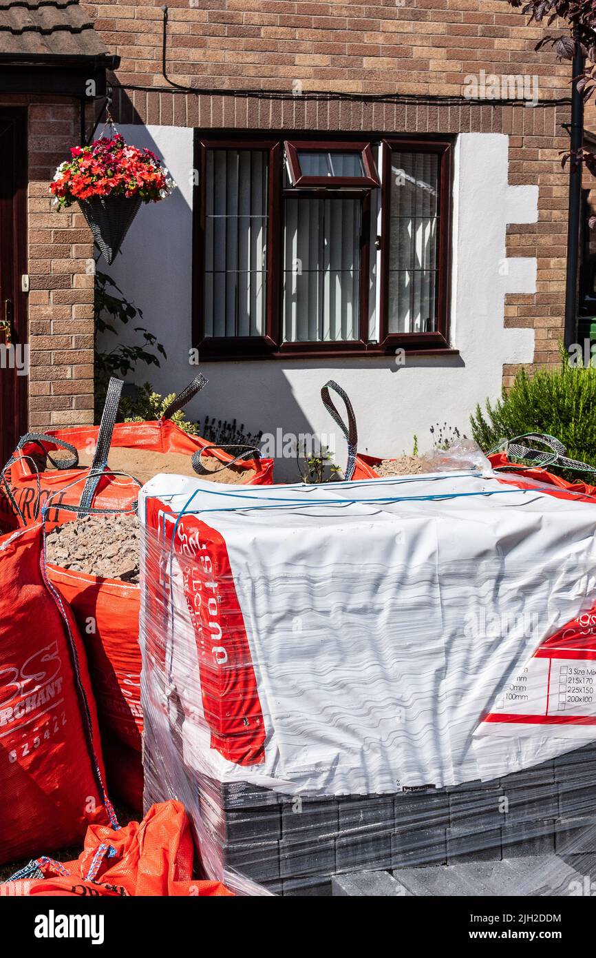 Construction. building work, bricks, materials outside a house in ...