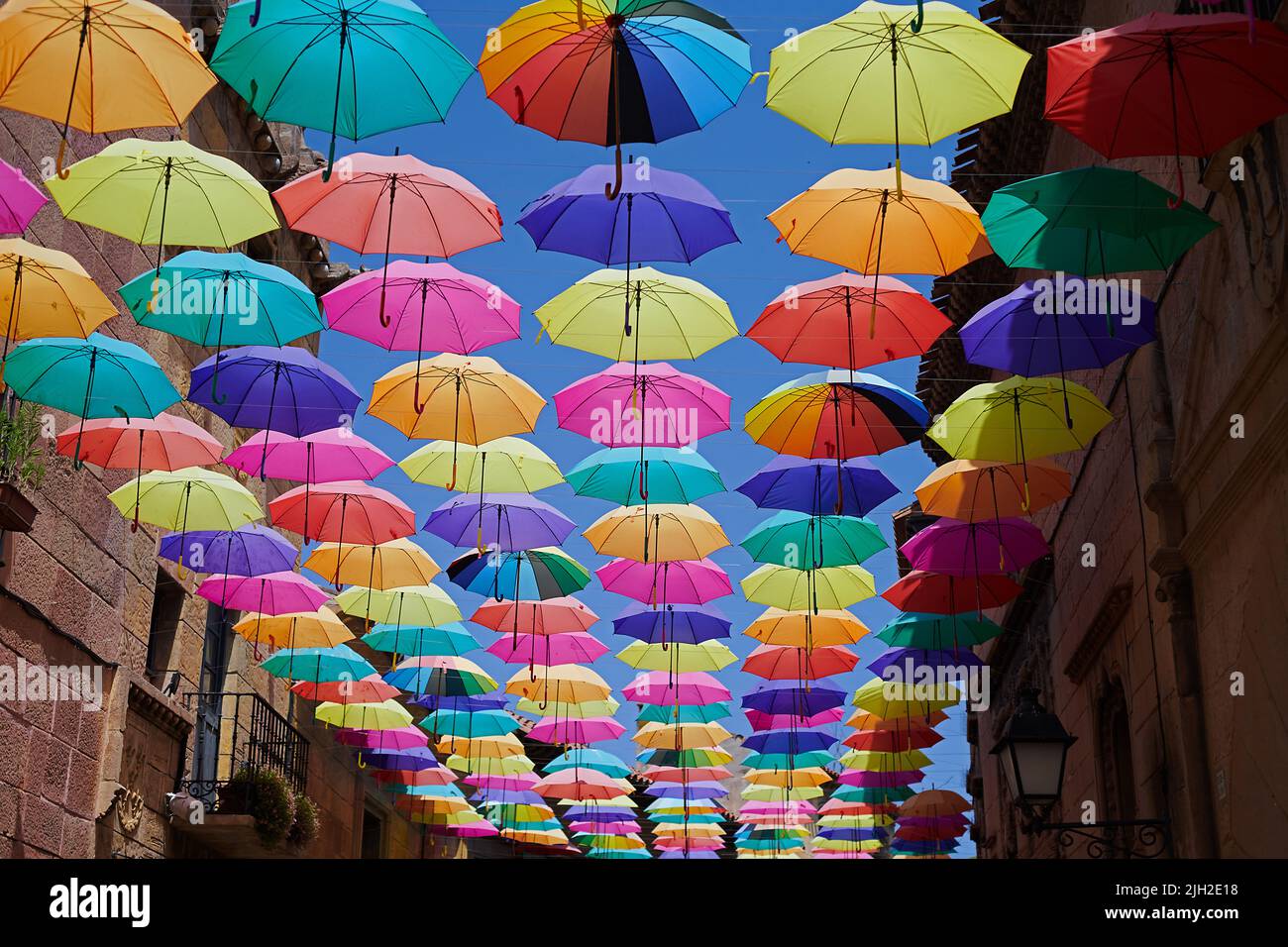 Umbrellas hanging over hi-res stock photography and images - Alamy
