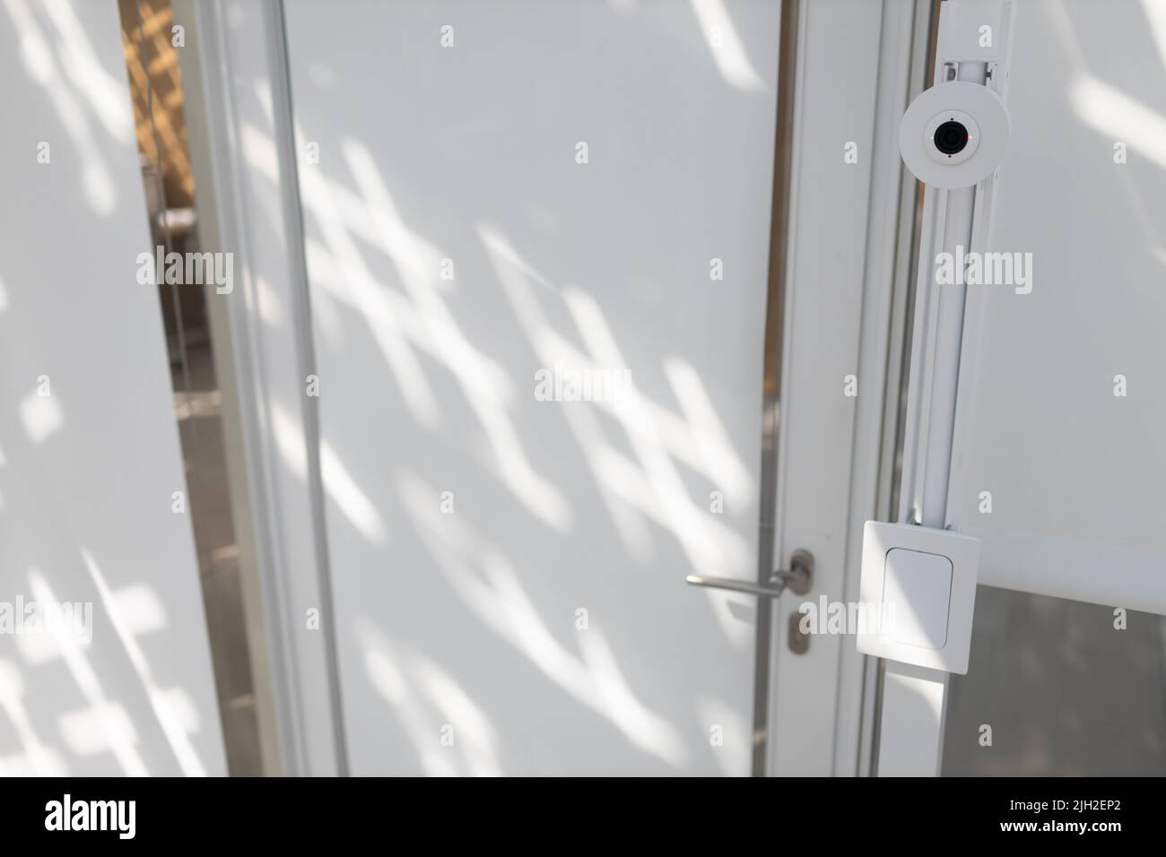 Face recognition system with camera in front of office in white ...