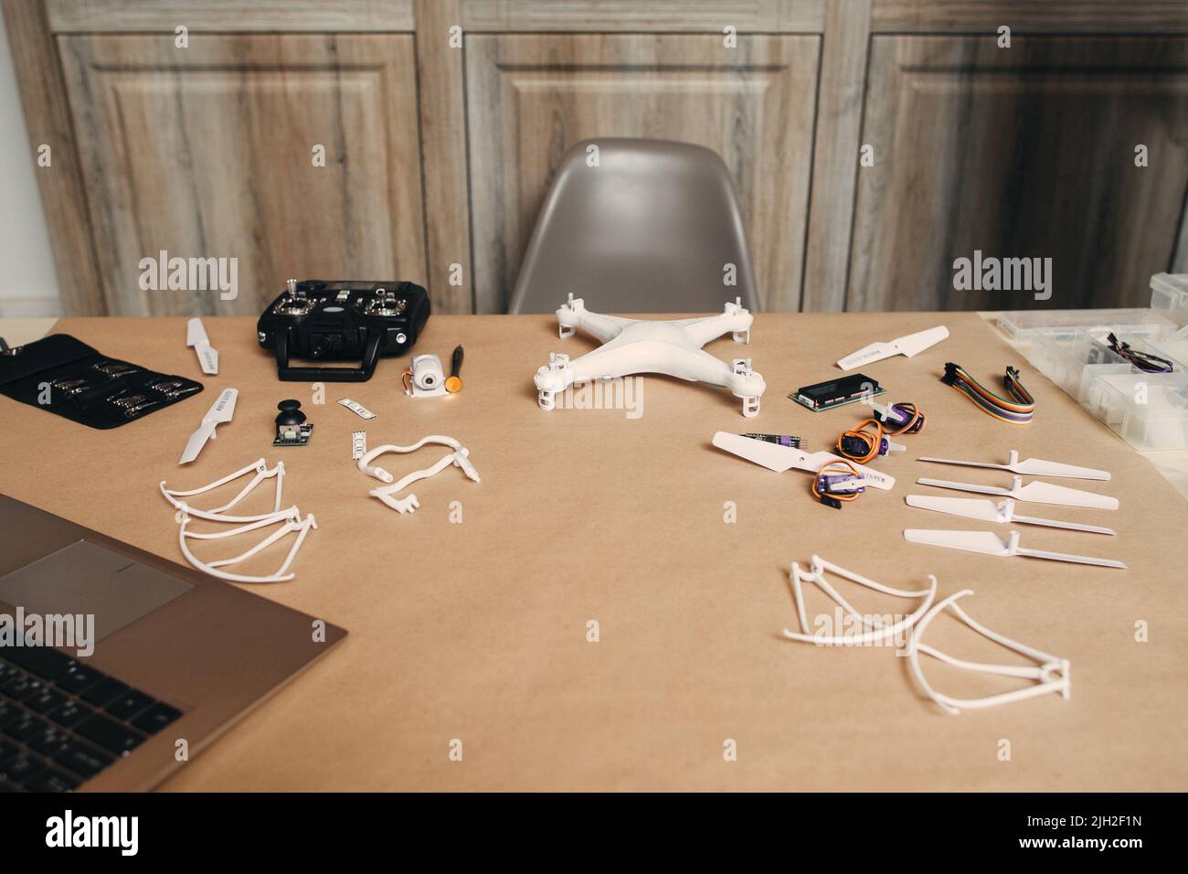 Workplace with components for drone building Stock Photo - Alamy