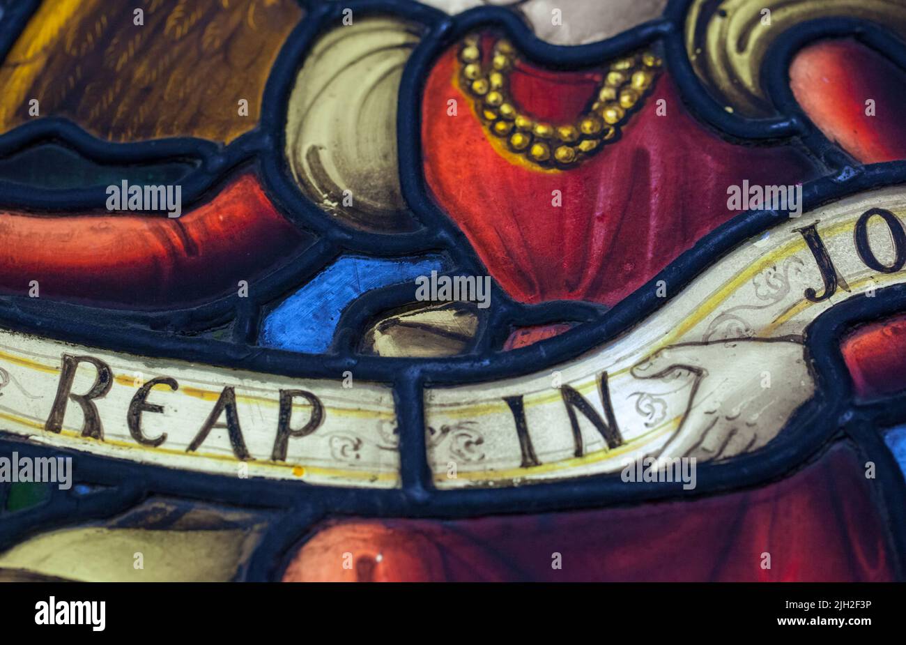 Abstract detail from a 19th Century stained glass roundel with an ...