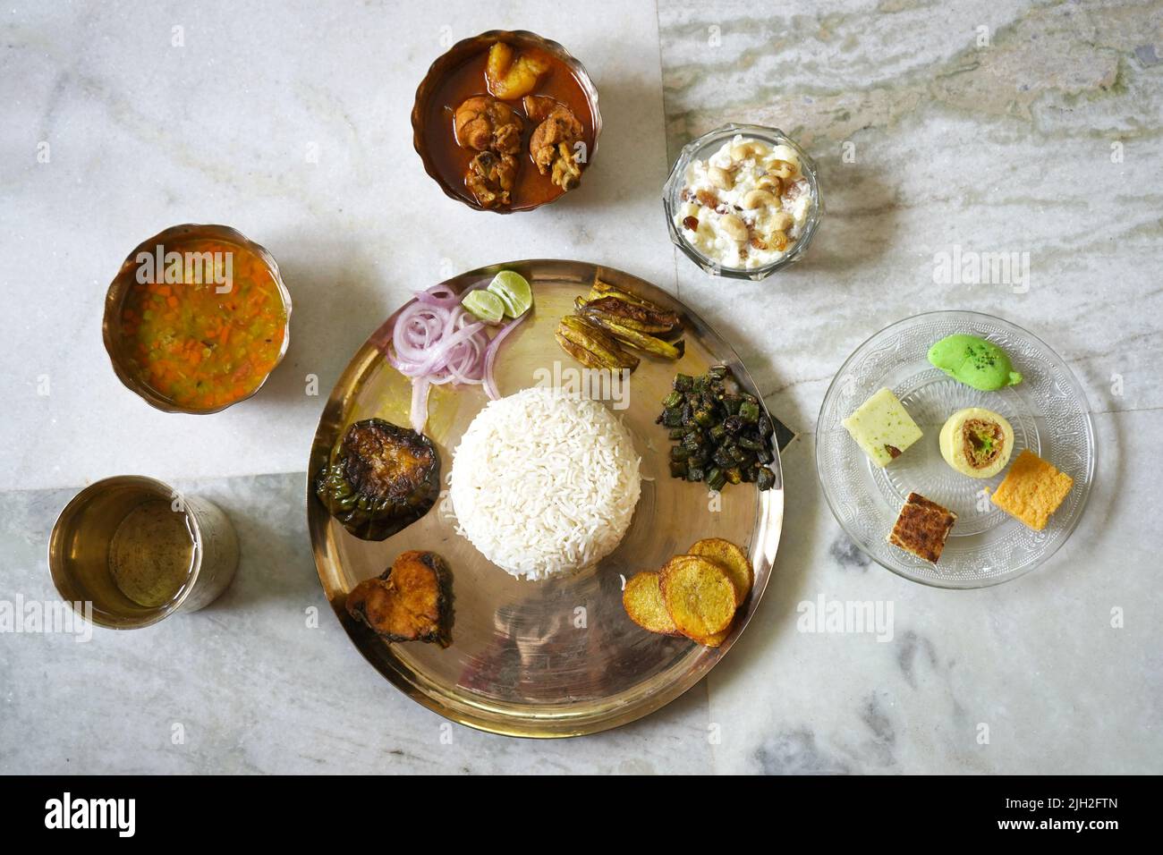A BENGALI THALI SERVED IN A OCCATION Stock Photo - Alamy