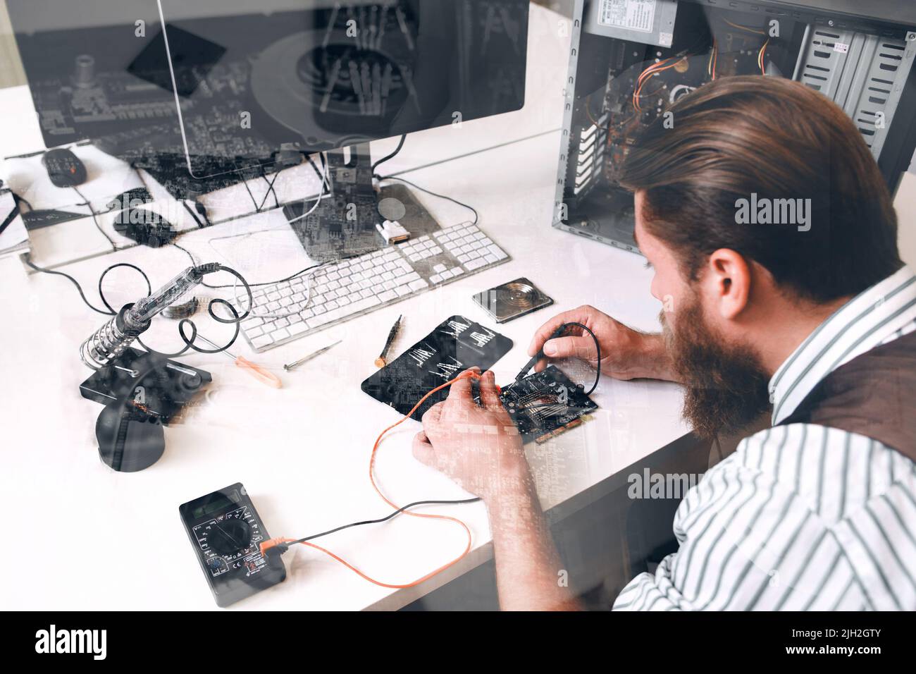 Computer circuit testing, double exposure Stock Photo - Alamy