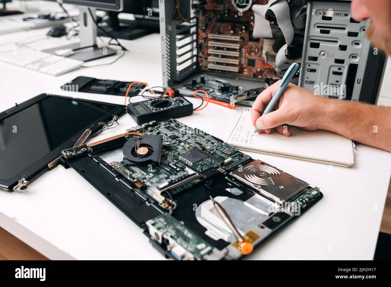 Computer motherboard diagnostics, close-up Stock Photo - Alamy