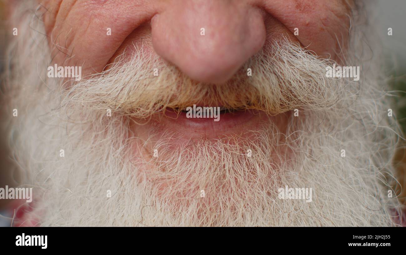 Close-up macro portrait of carefree senior old grandfather man 60s ...