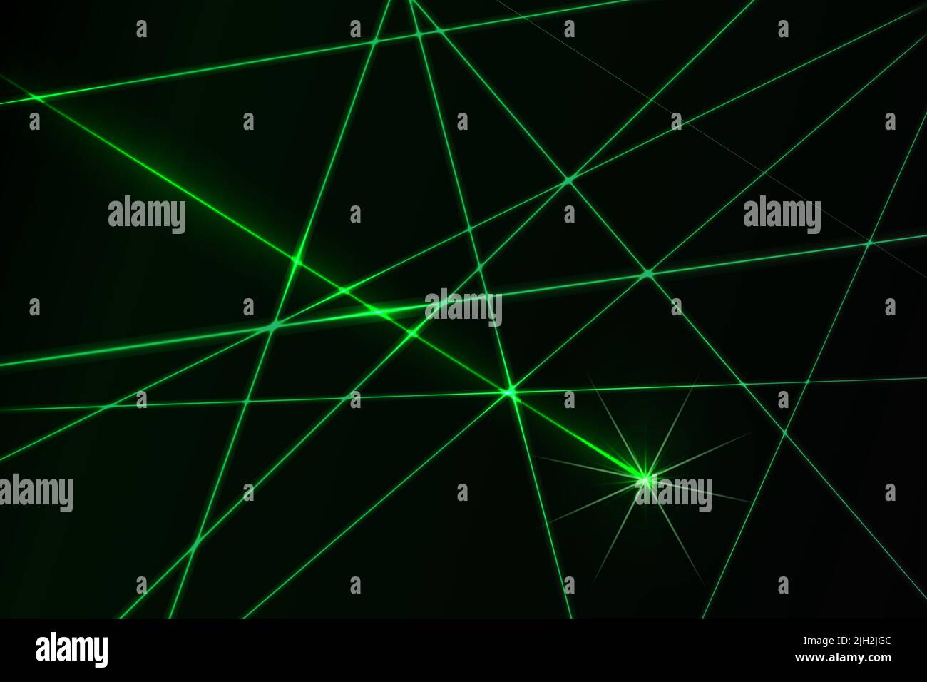 Laser field.Intersecting glowing laser security beams on a dark ...