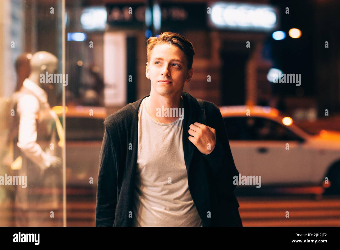 People walking through building night hi-res stock photography and ...
