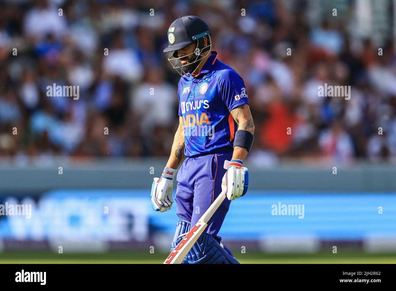 Virat Kohli of India leaves the field after being caught by Jos Buttler ...