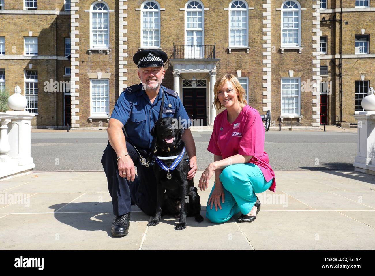 Handout photo issued by the PDSA of police dog Dexter wearing his PDSA ...