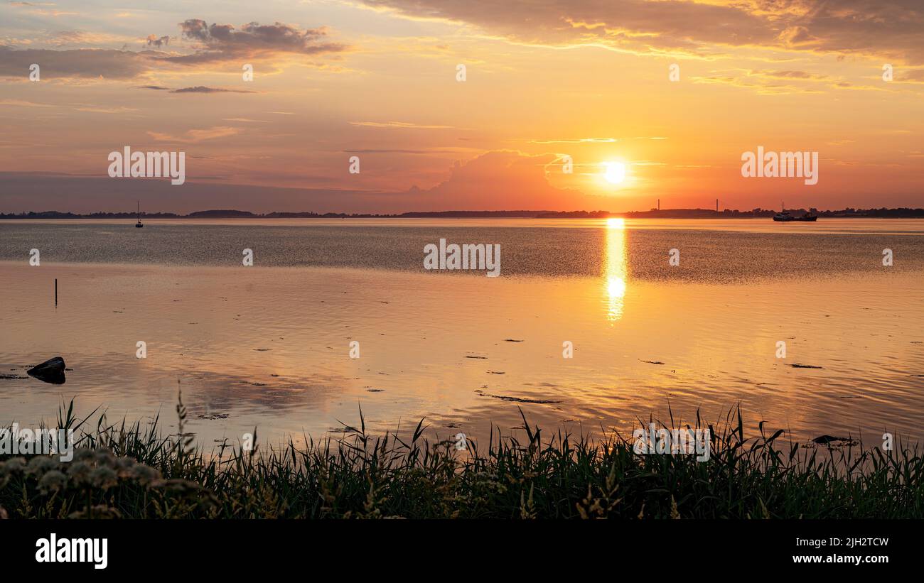 A view of the faro bridge at sunset as veiwed from stubbekoping in ...